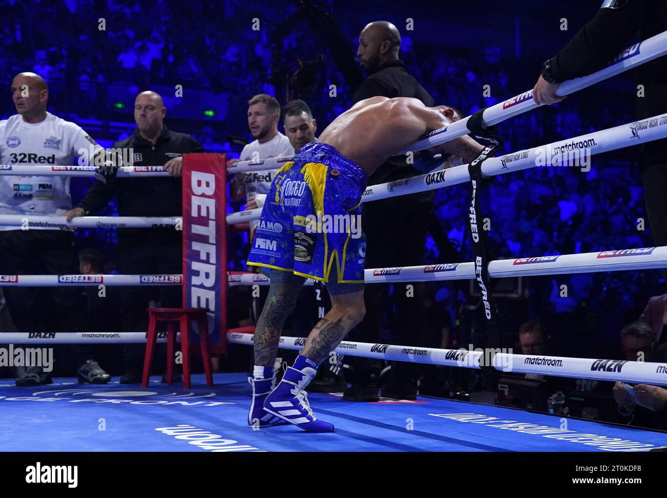 Josh Warrington reacts after losing by TKO against Leigh Wood in their WBA Featherweight World ...