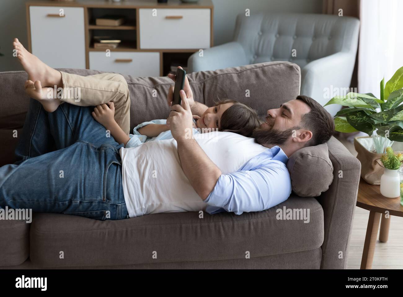 Lazy son sofa hi-res stock photography and images - Alamy