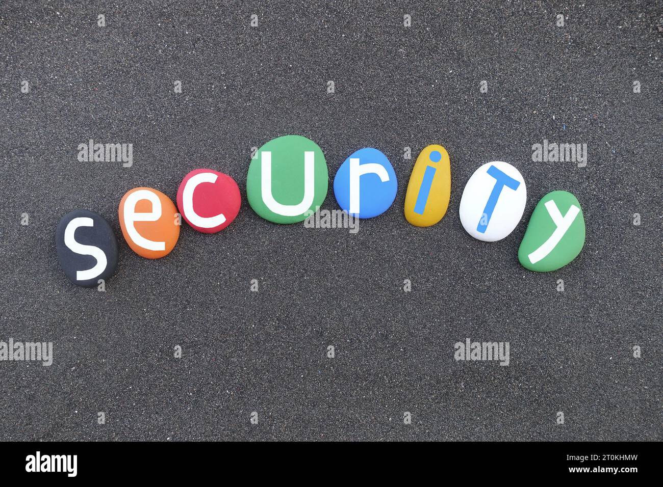 Security, creative text composed with multi colored stone letters over ...