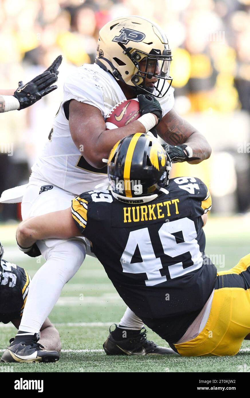 Purdue running back Dylan Downing (22) is tackled by Iowa defensive ...