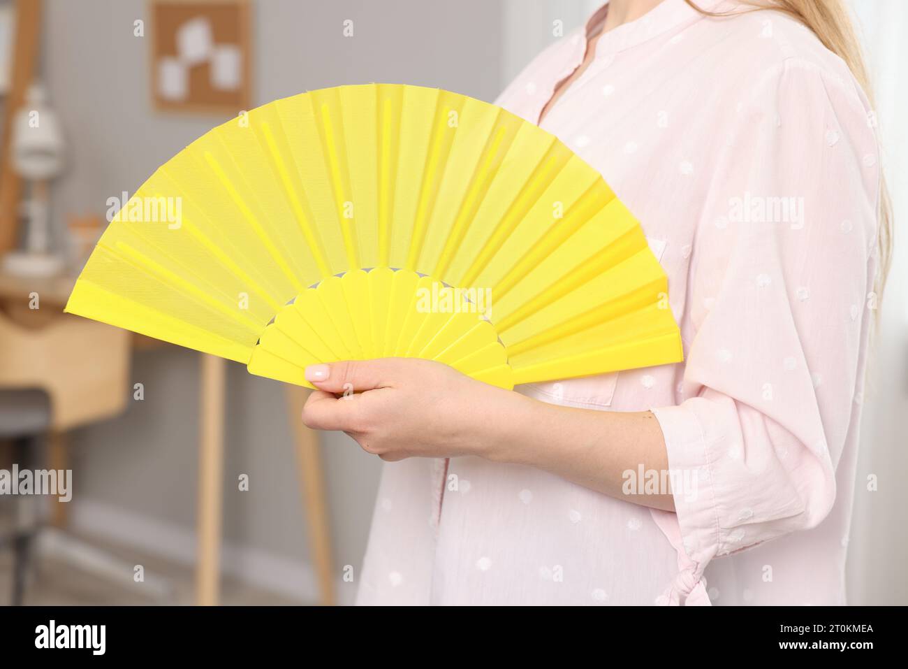 Yellow chinese fan hi-res stock photography and images - Alamy