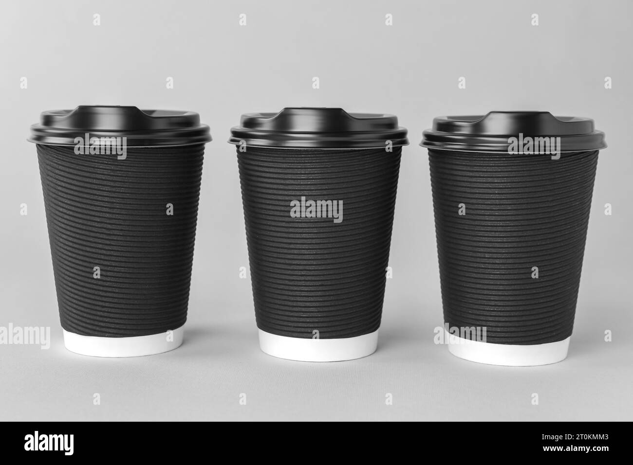 Paper cup plastic lids Black and White Stock Photos & Images - Alamy