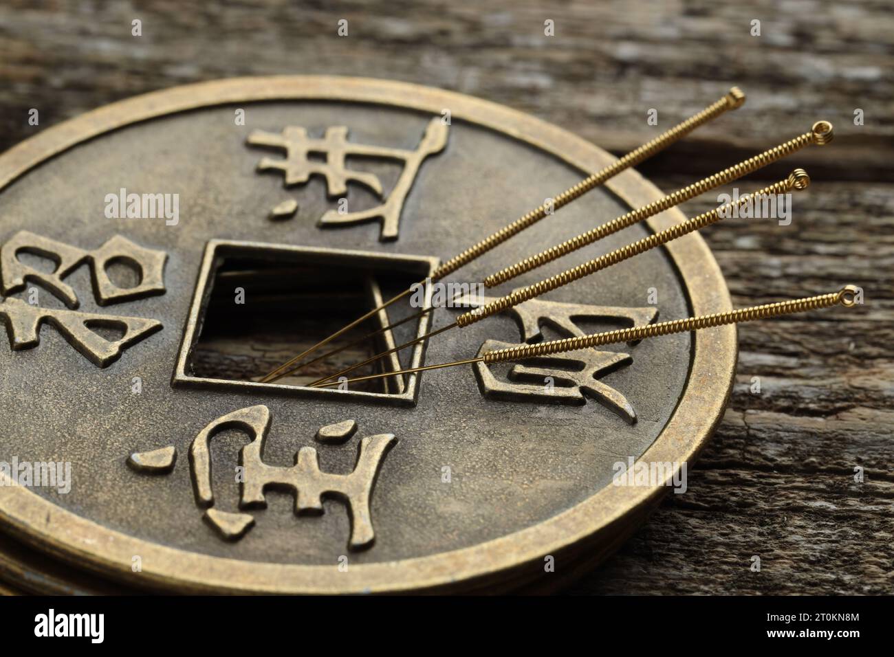 Acupuncture needles antique chinese coin hi-res stock photography and ...