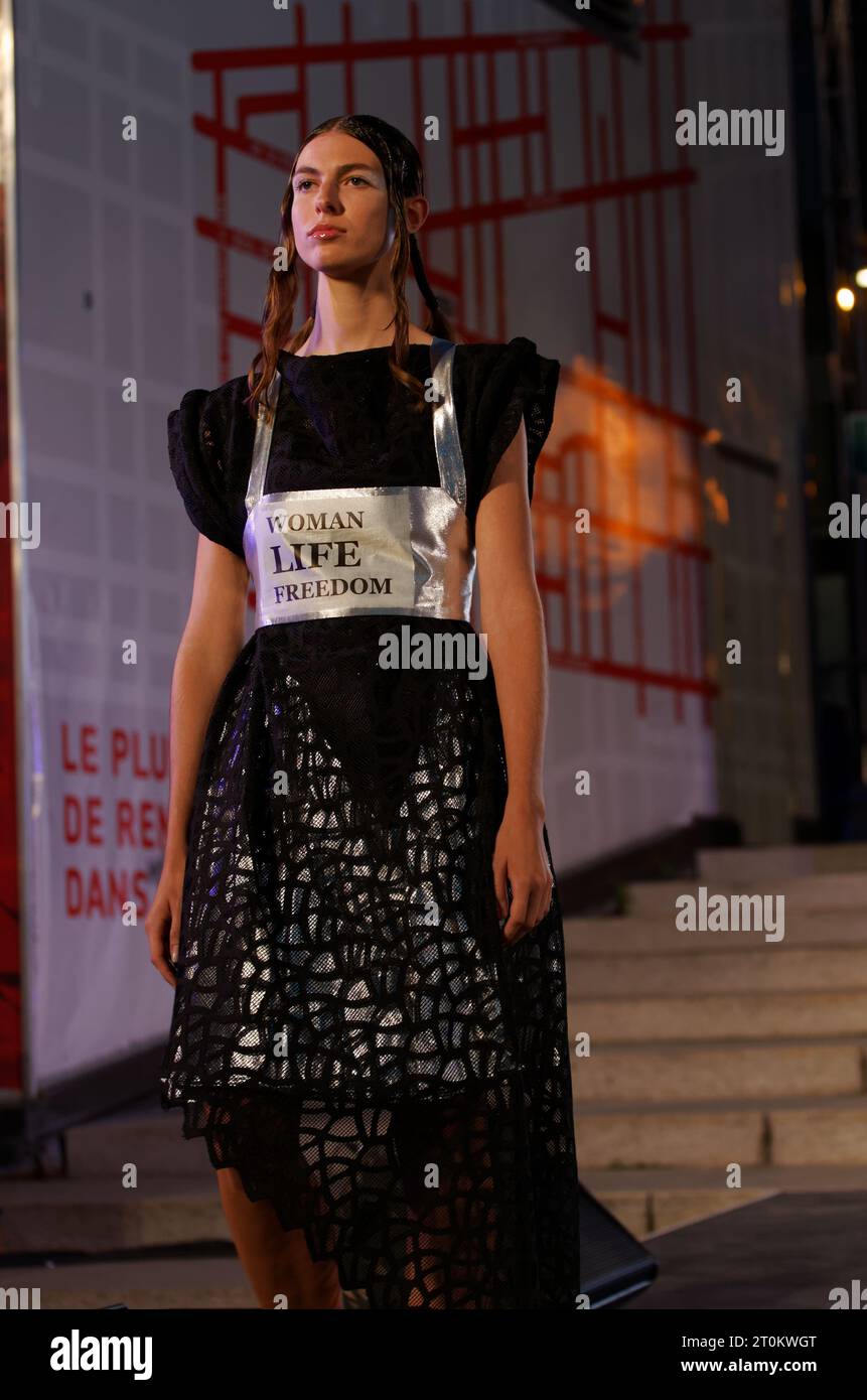 Model poses on the runway at the Rahi Tam fashion show held in Montreal ...