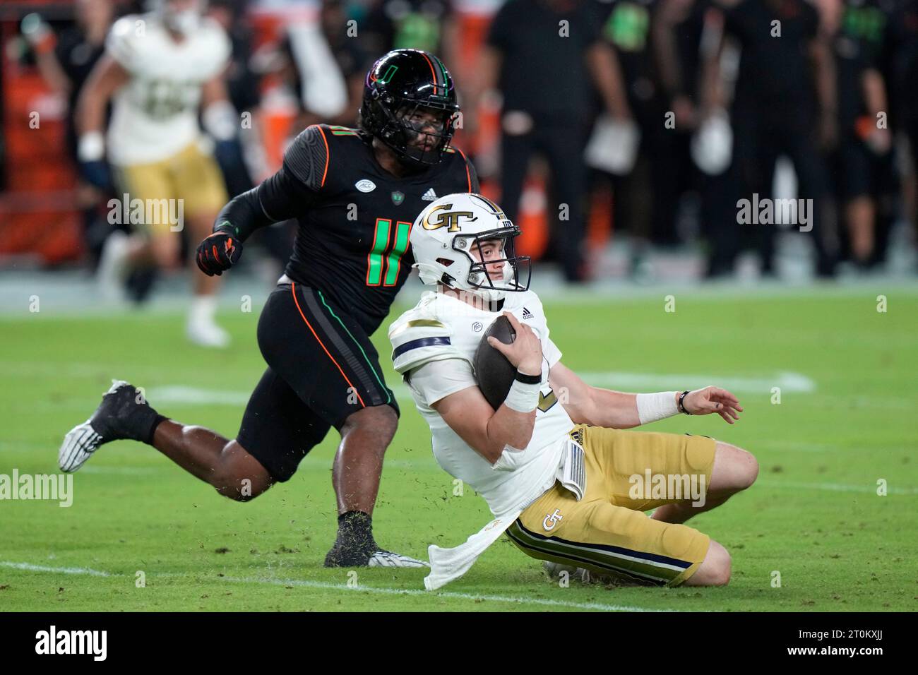 Georgia Tech quarterback Haynes King (10) slides as he scrambles with ...