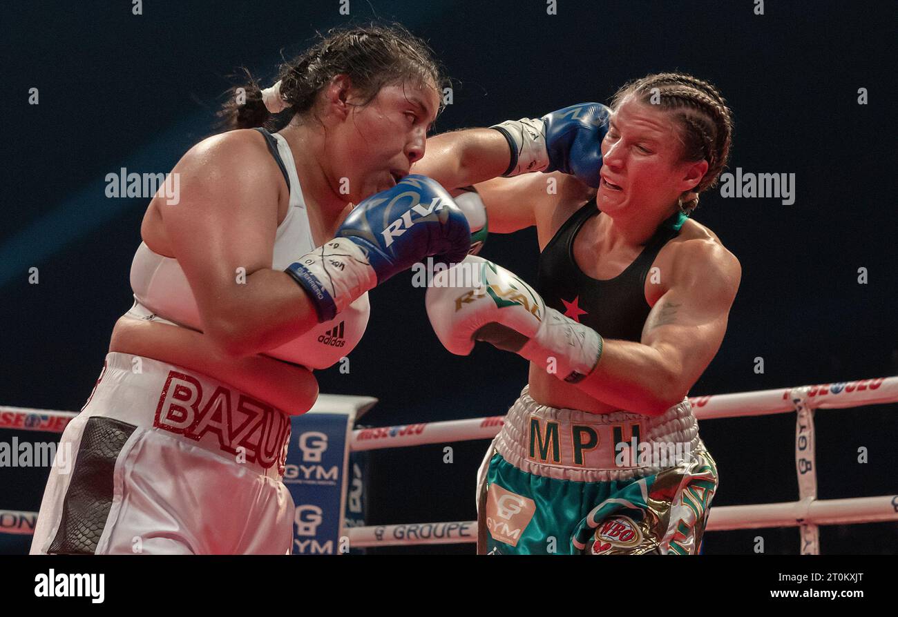 Marie Pier Houle, right, and Cindy Reyes Espinoza, left, exchange blows ...