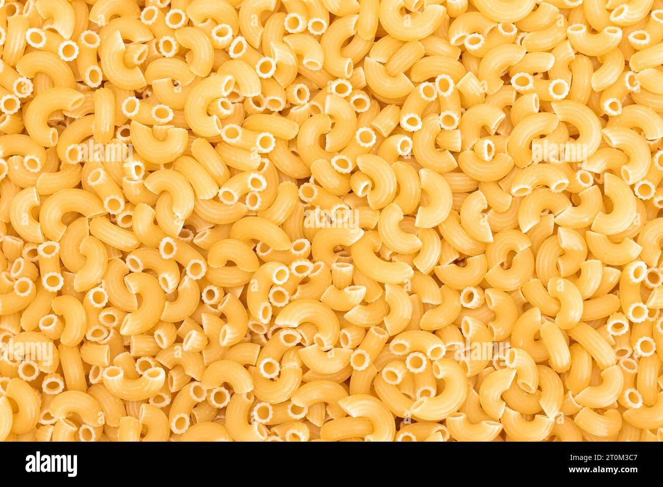 Uncooked Chifferi Rigati Pasta Background. Fat and Unhealthy Food ...