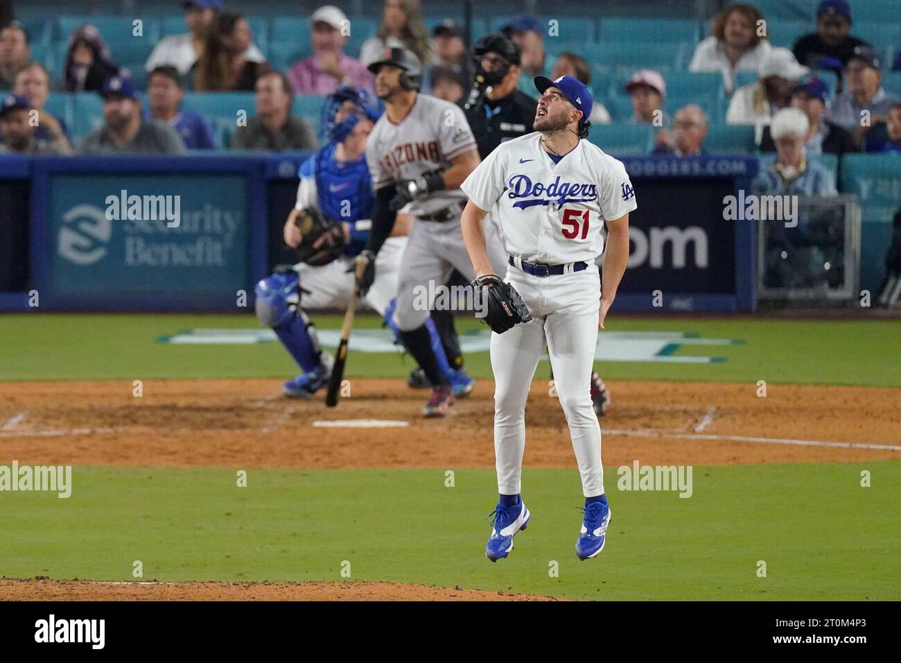 Los Angeles Dodgers relief pitcher Alex Vesia (51) reacts as he watches ...