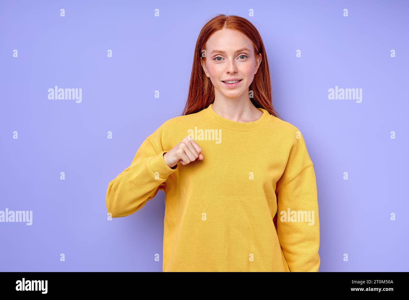 Young deaf mute cheerful woman teaching how to speak sign language ...