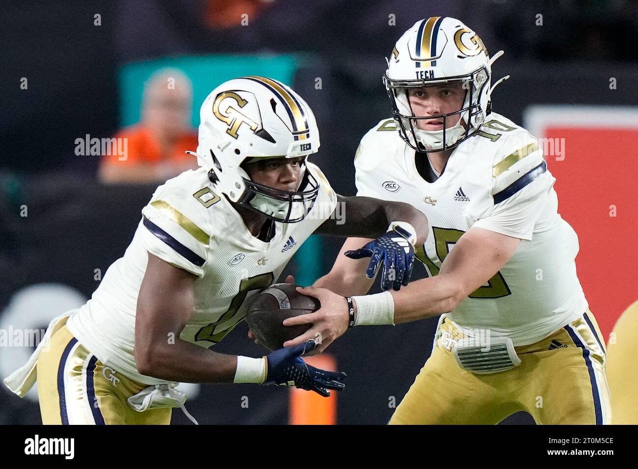 Georgia Tech quarterback Haynes King hands off to running back Trey ...