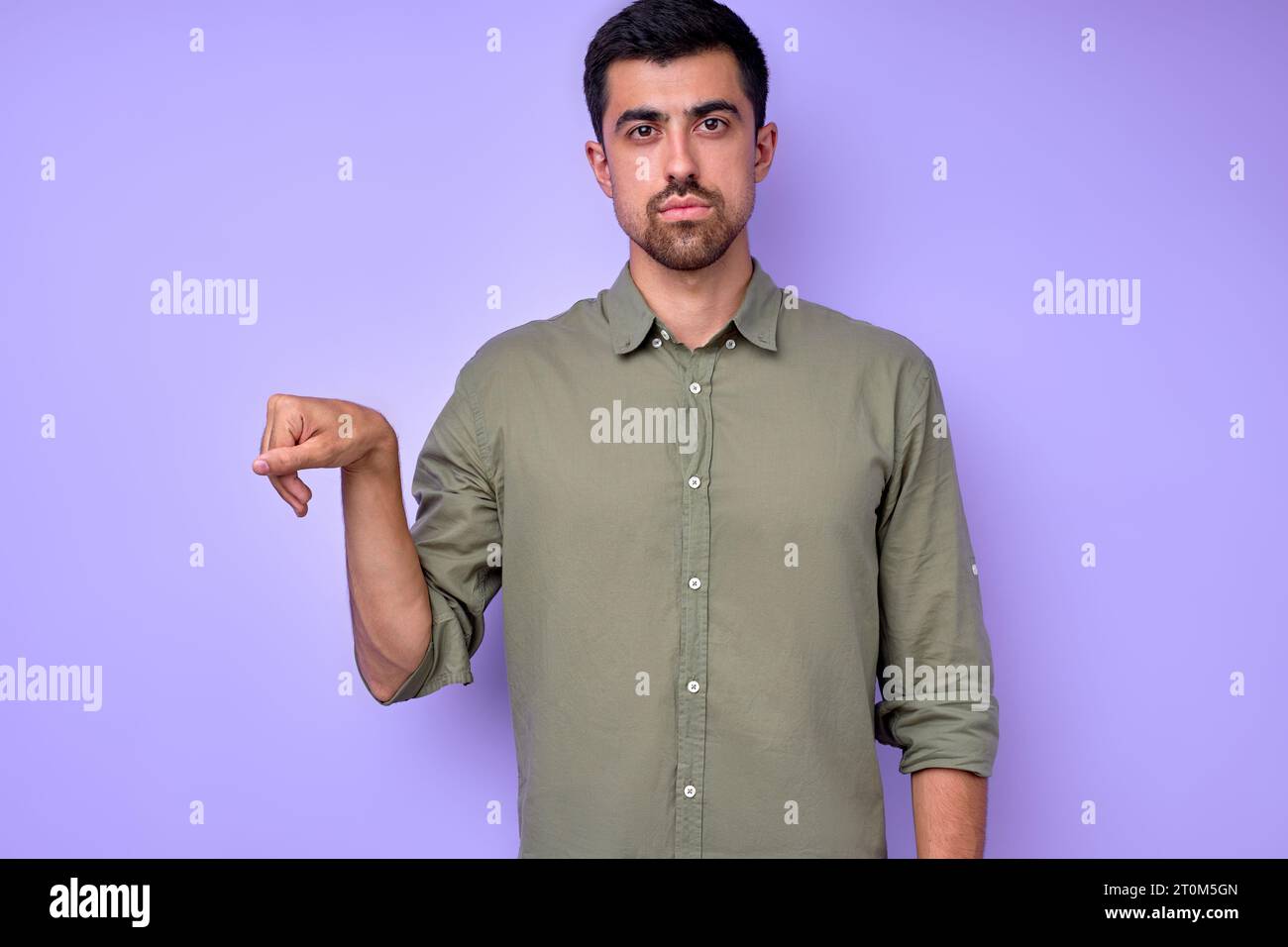 serious handsome man showing letter X x with fingers .the Alphabet in ...