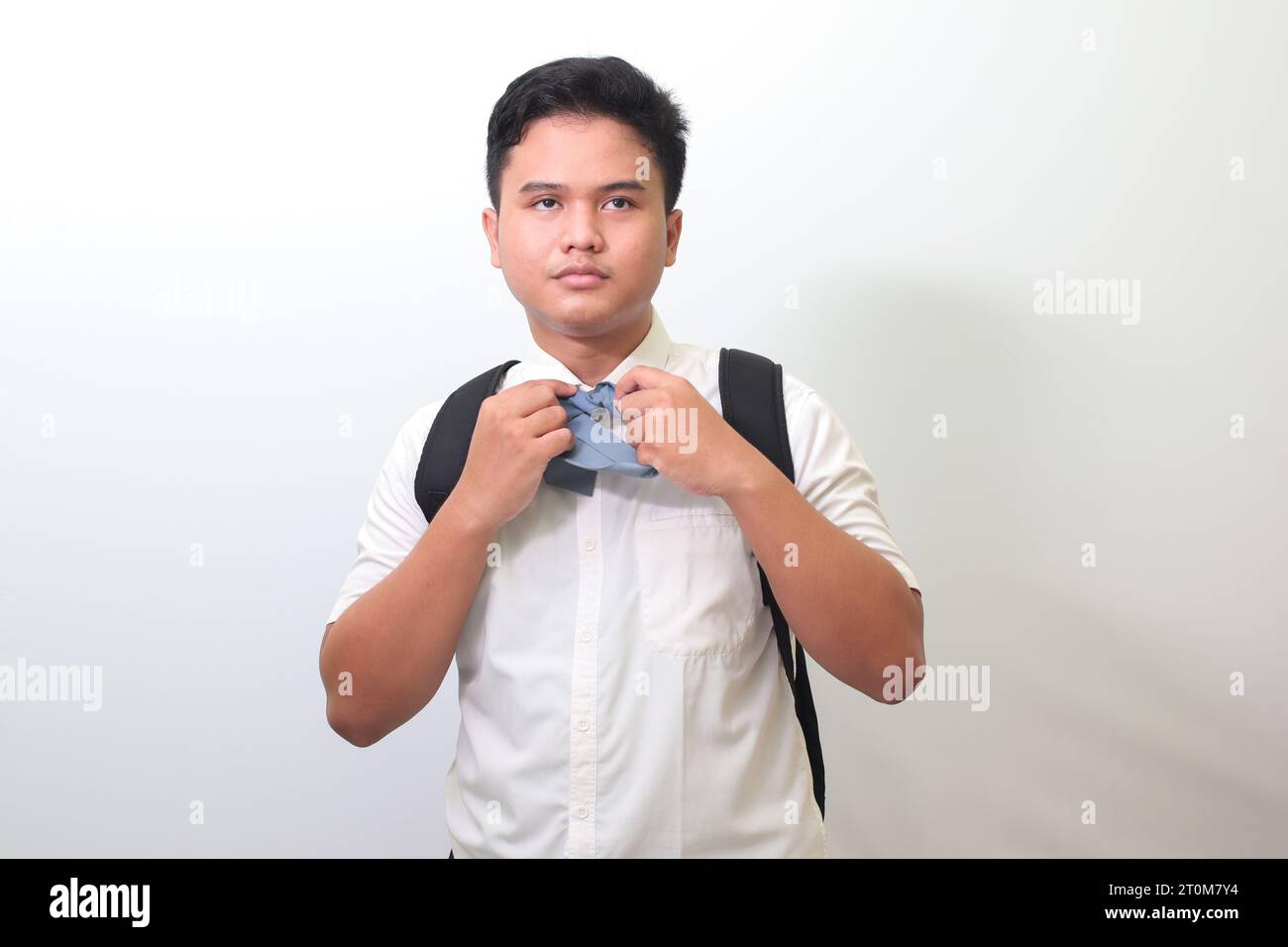 Indonesian senior high school student wearing white shirt uniform with ...