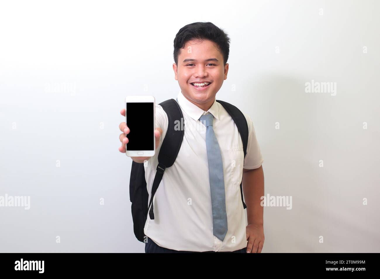 Indonesian senior high school student wearing white shirt uniform with ...