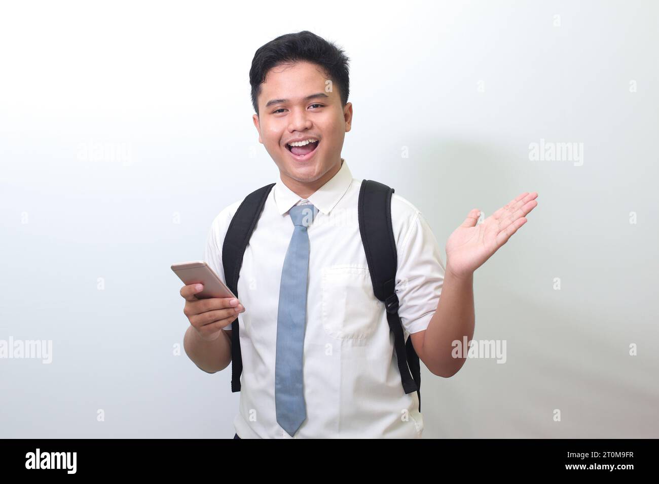 Indonesian senior high school student wearing white shirt uniform with ...