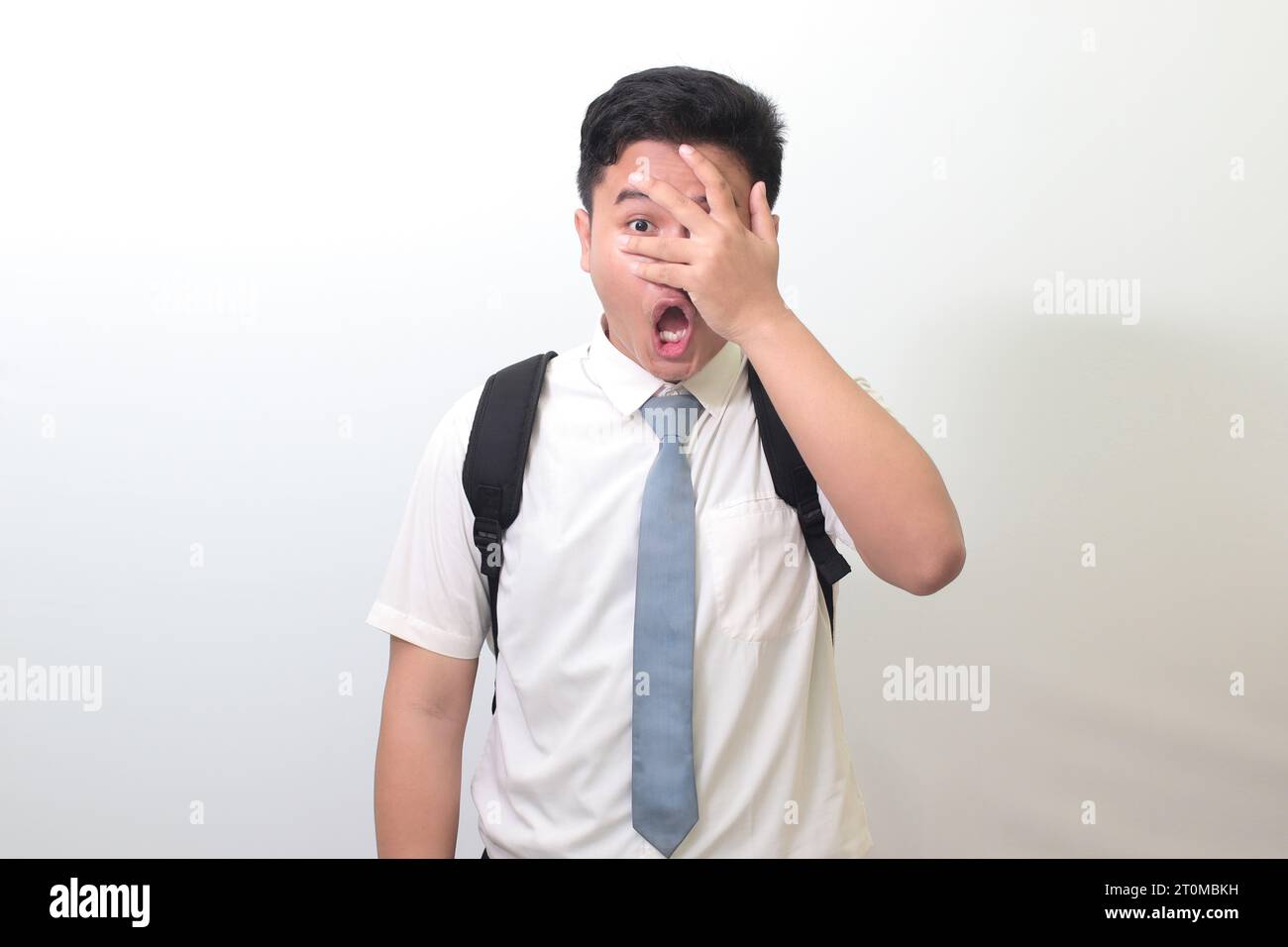 Indonesian senior high school student wearing white shirt uniform with ...