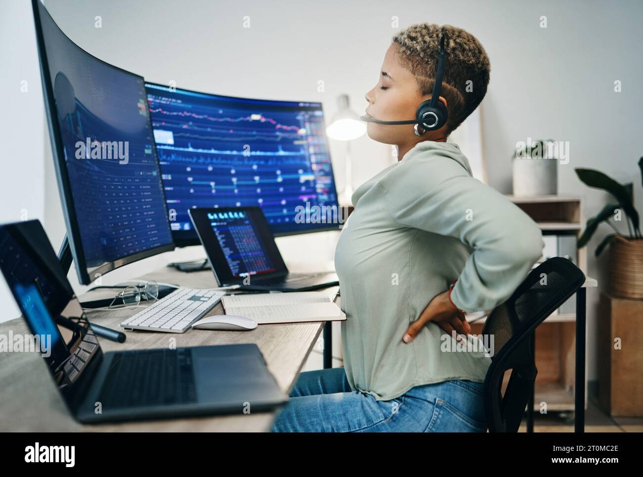 Back pain, call center and woman working on computer with stress ...