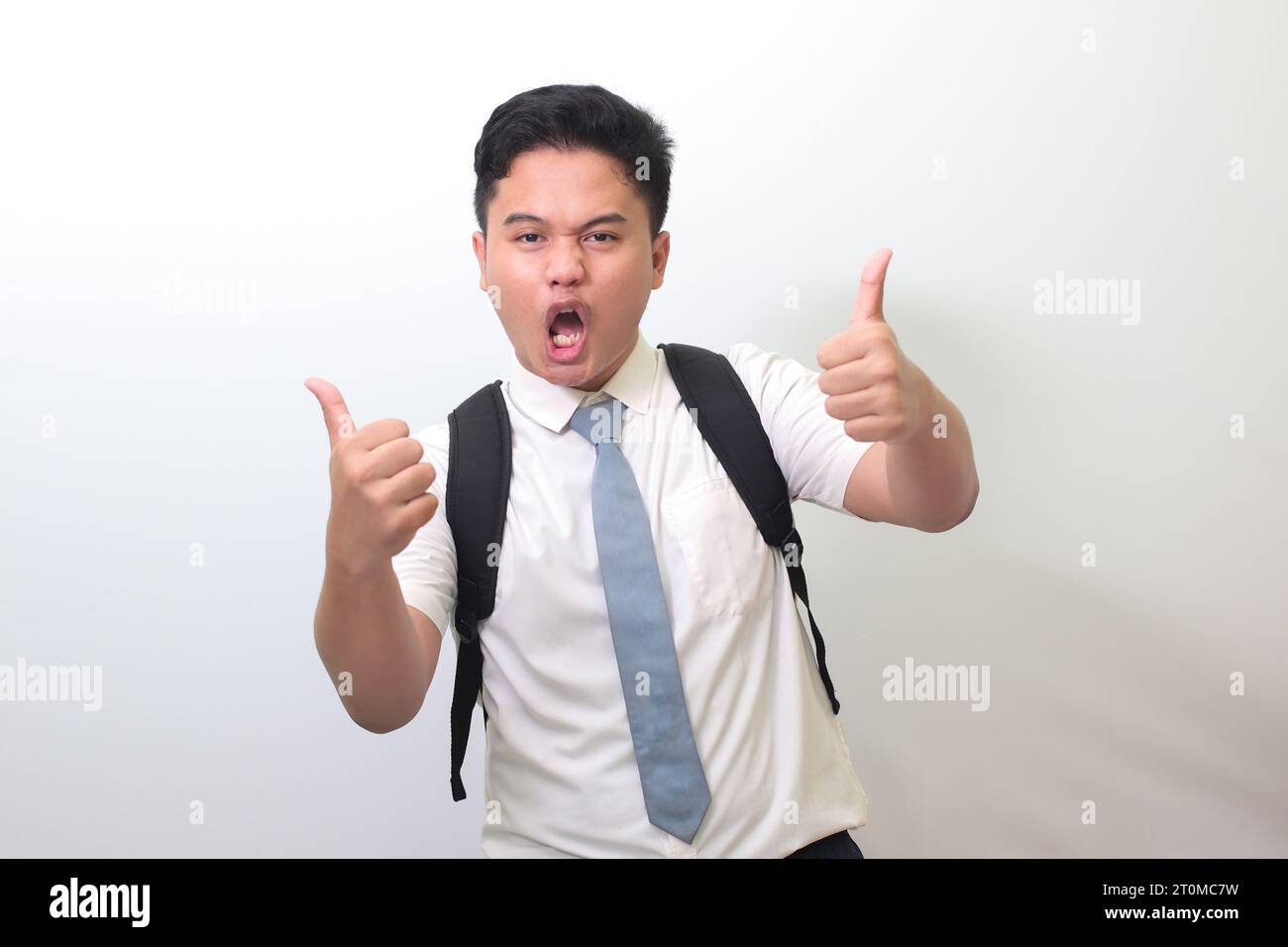 Indonesian senior high school student wearing white shirt uniform with ...