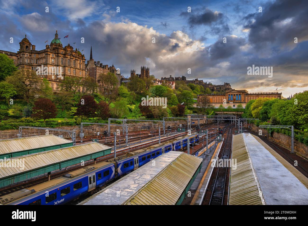 Edinburgh Waverley main railway station with train at platform and Old ...
