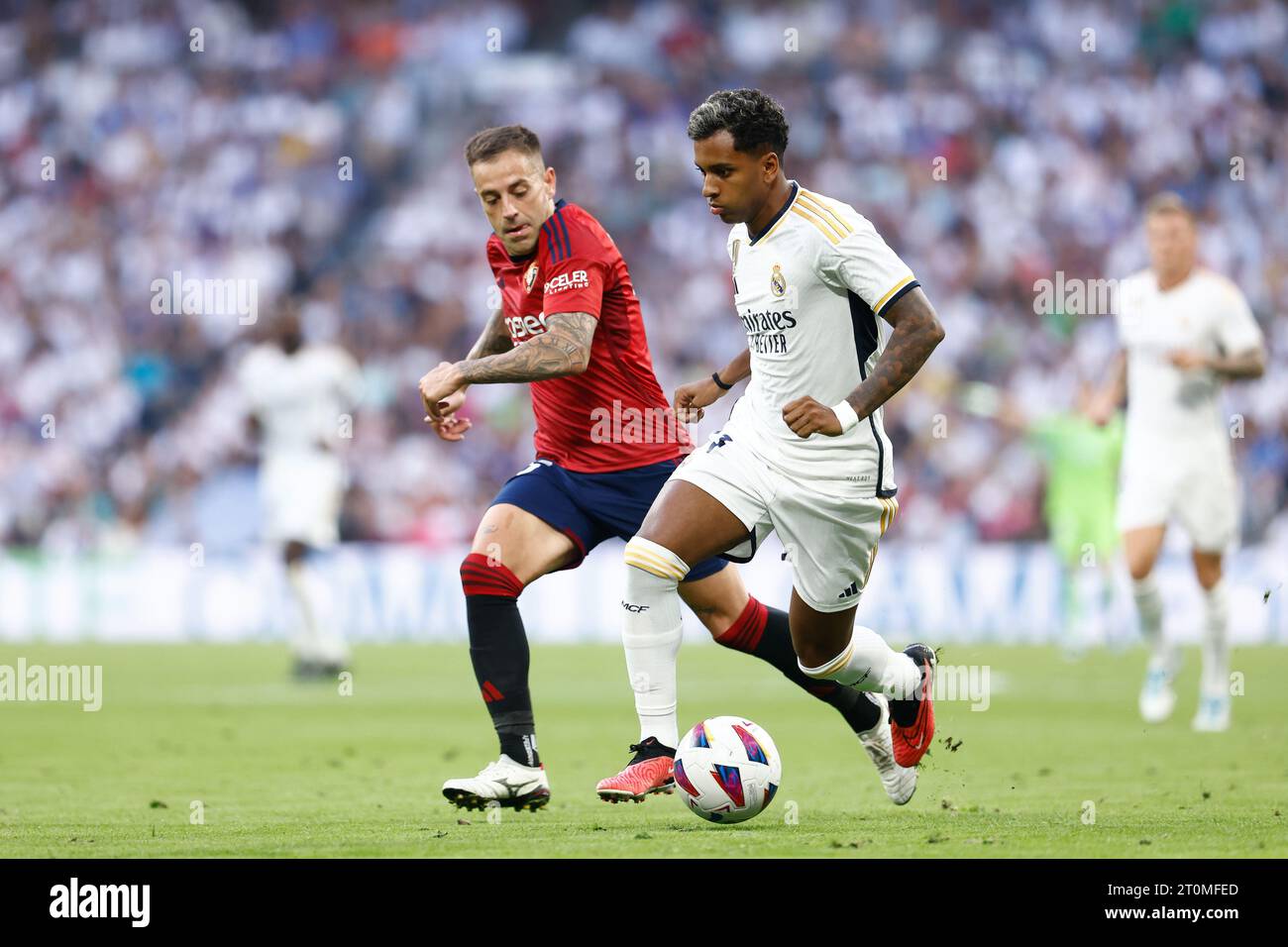 Rodrygo Goes of Real Madrid and Ruben Pena of CA Osasuna during the ...