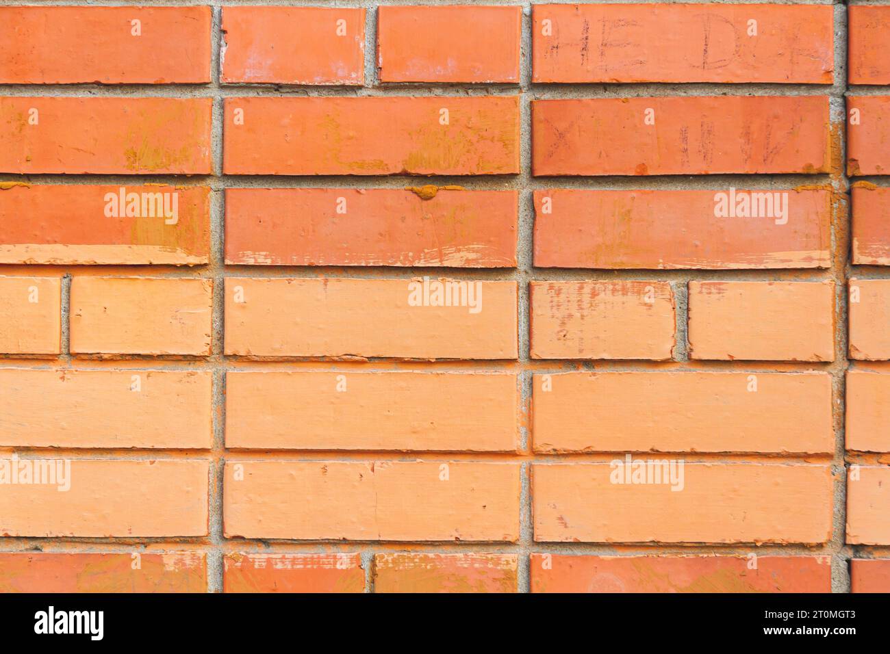 Red brick wall texture with smooth stone blocks. High-quality texture ...
