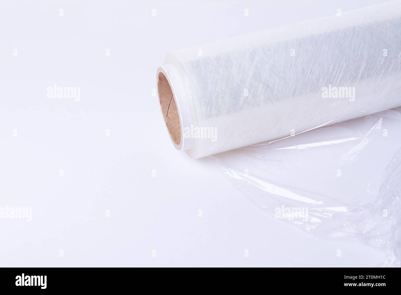 Packing the goods in a cardboard box and stretch film. Tools for ...