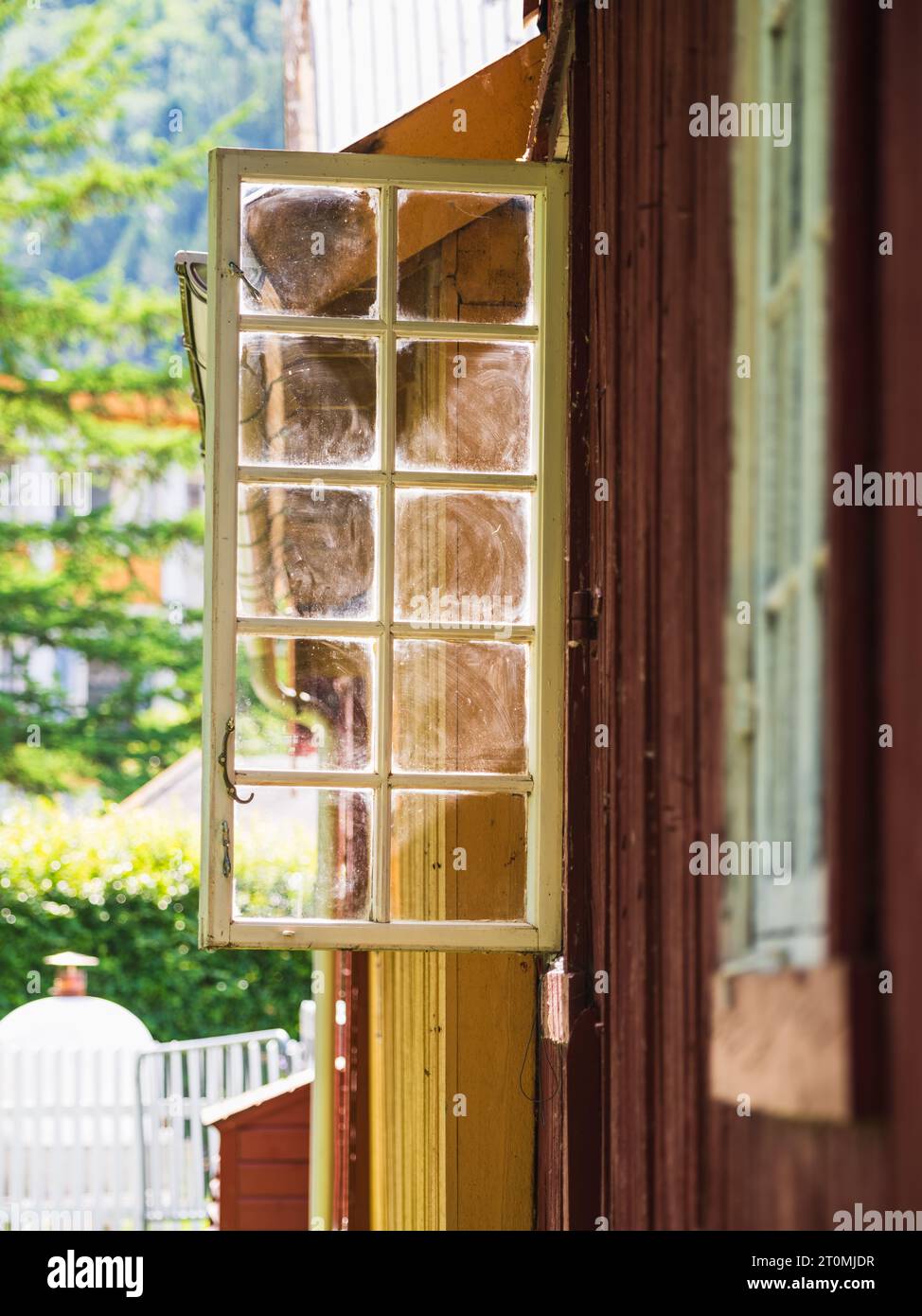 Norwegian wooden window, open, sunny day, serene atmosphere, no people ...
