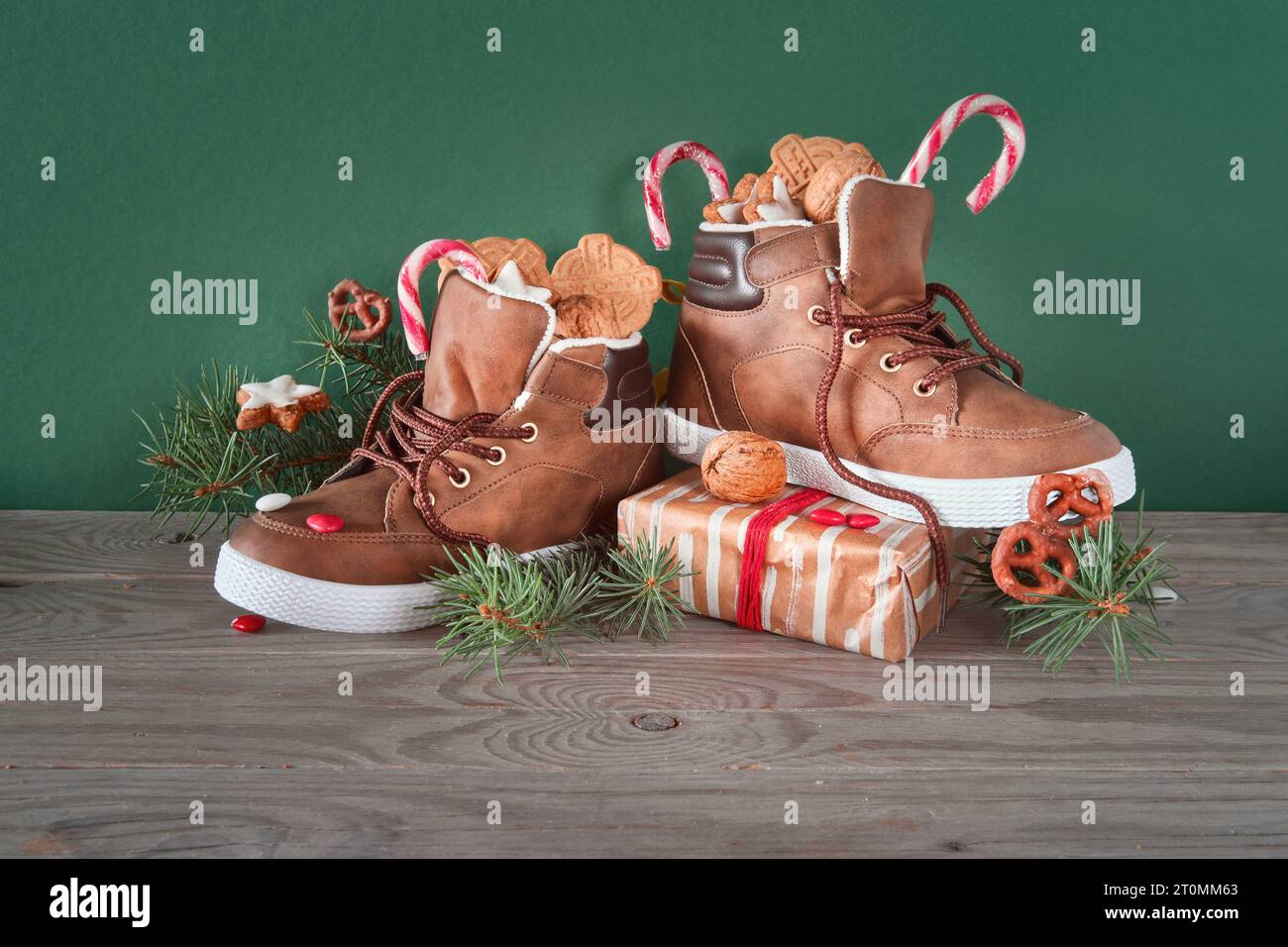 Saint Nicholas Day or Nikolaus. Children shoes filled with traditional ...