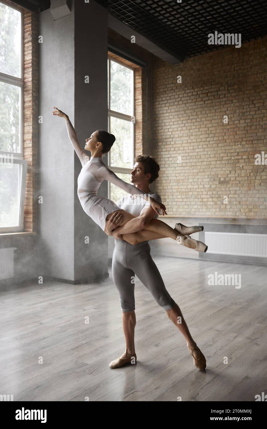 Artists graceful dance movement, ballet dancers performing beautiful ...