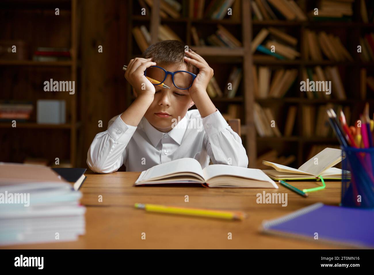 Boy falling desk hi-res stock photography and images - Alamy