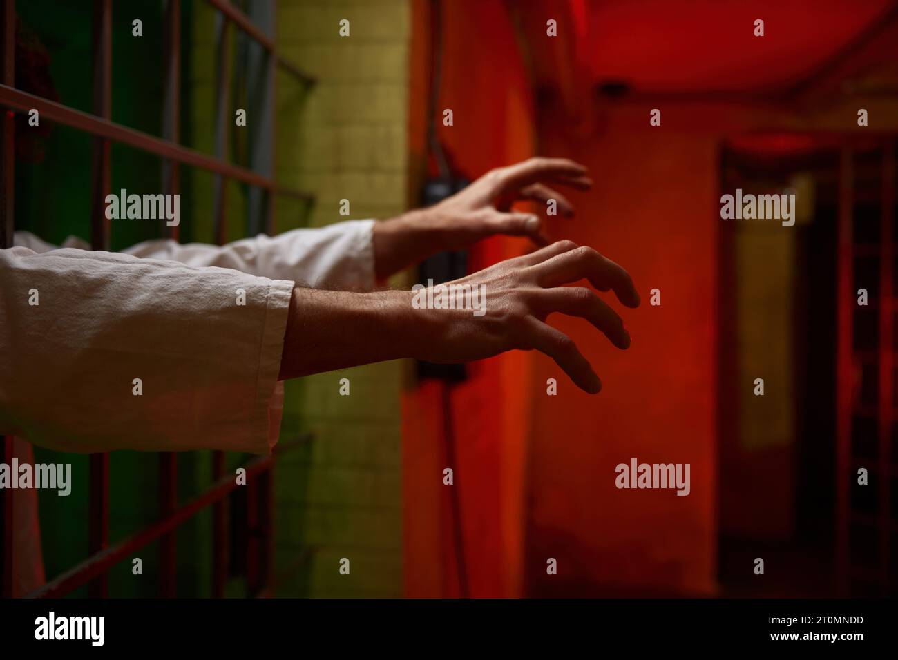 Closeup focus on reaching hands of psychiatric clinic patient Stock ...