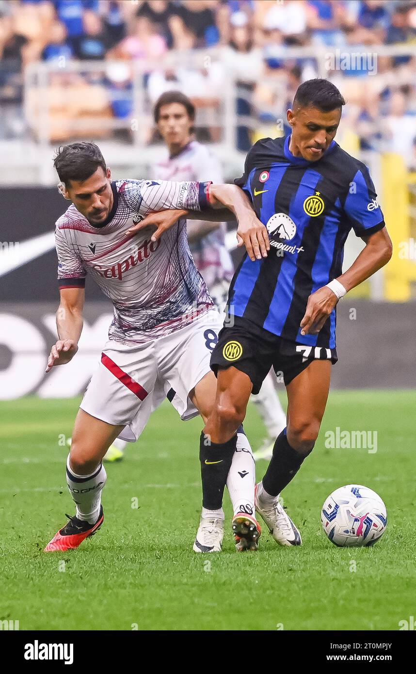 Alexis Sanchez (Inter)Remo Freuler (Bologna) during the Italian "Serie ...