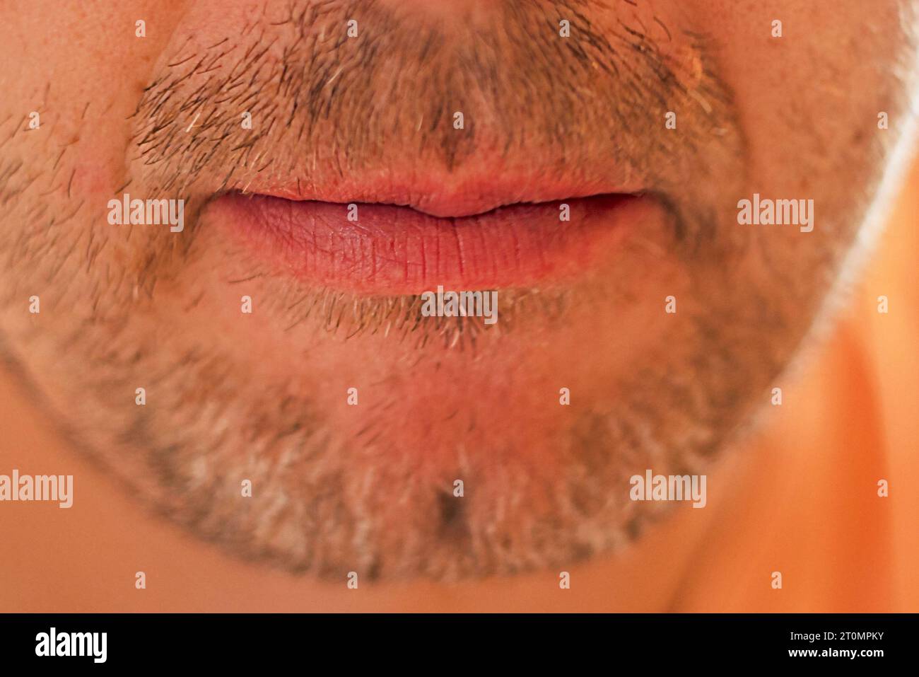 man chews food with his mouth closed Stock Photo - Alamy