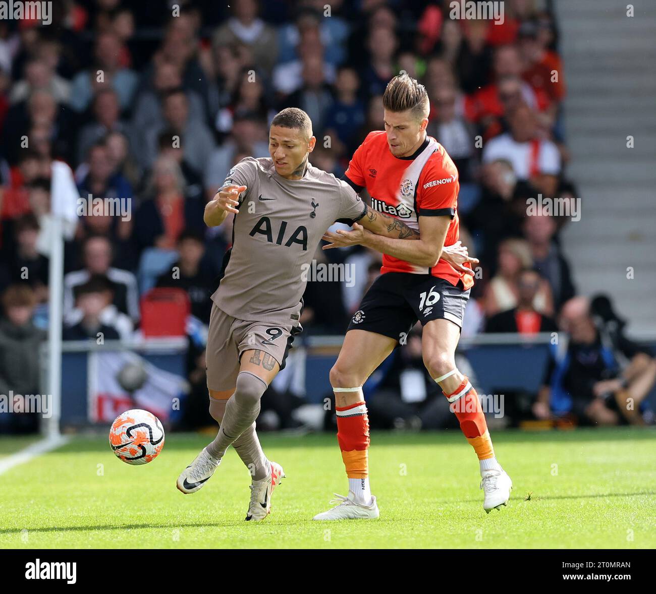 Luton, UK. 7th Oct, 2023. Reece Burke of Luton Town with Richarlison of ...
