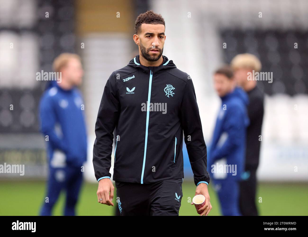 Rangers' Connor Goldson inspects the pitch ahead of the cinch ...