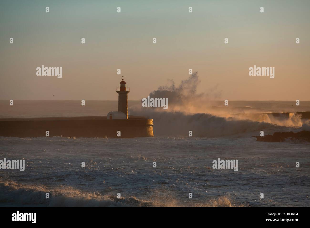 Porto lighthouse in Portugal with big waves Stock Photo - Alamy