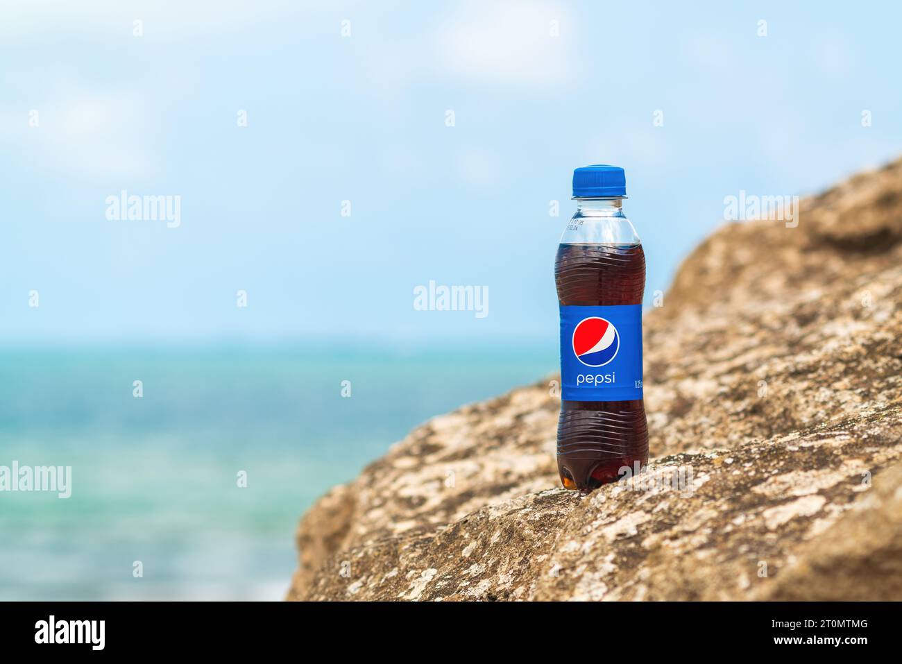 A bottle of refreshing drink Pepsi on the summer beach Stock Photo - Alamy