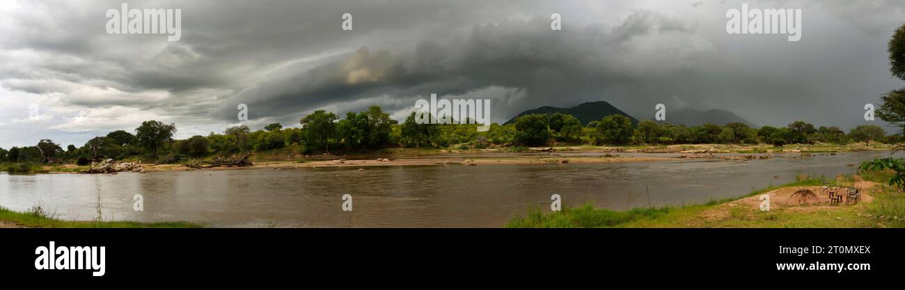 Rain clouds build along the Great Ruaha River. rain is already falling ...