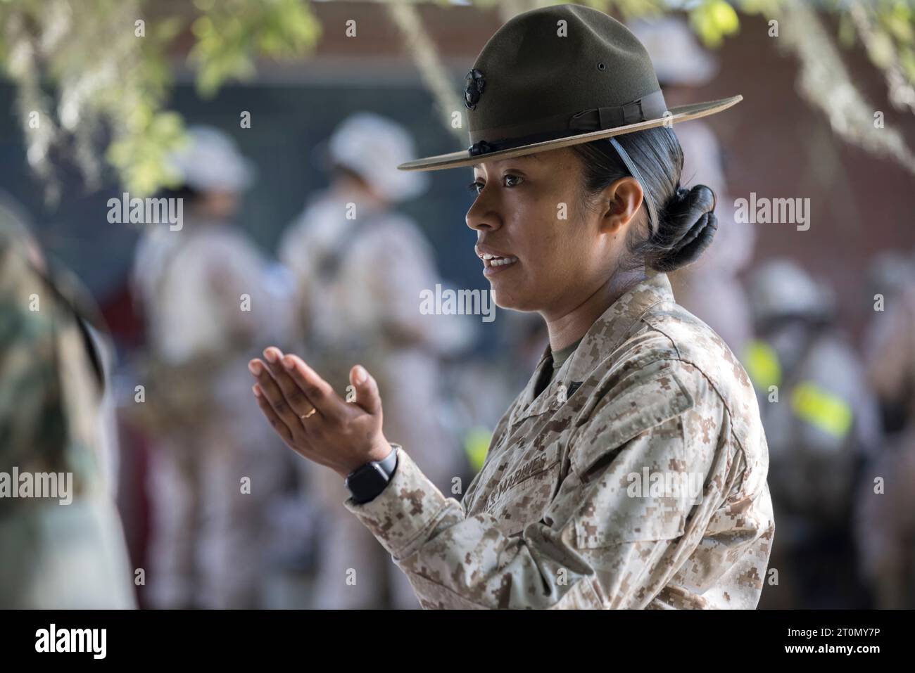 U.S. Marine Corps Drill Instructor Sgt. Maria Torres answers questions ...