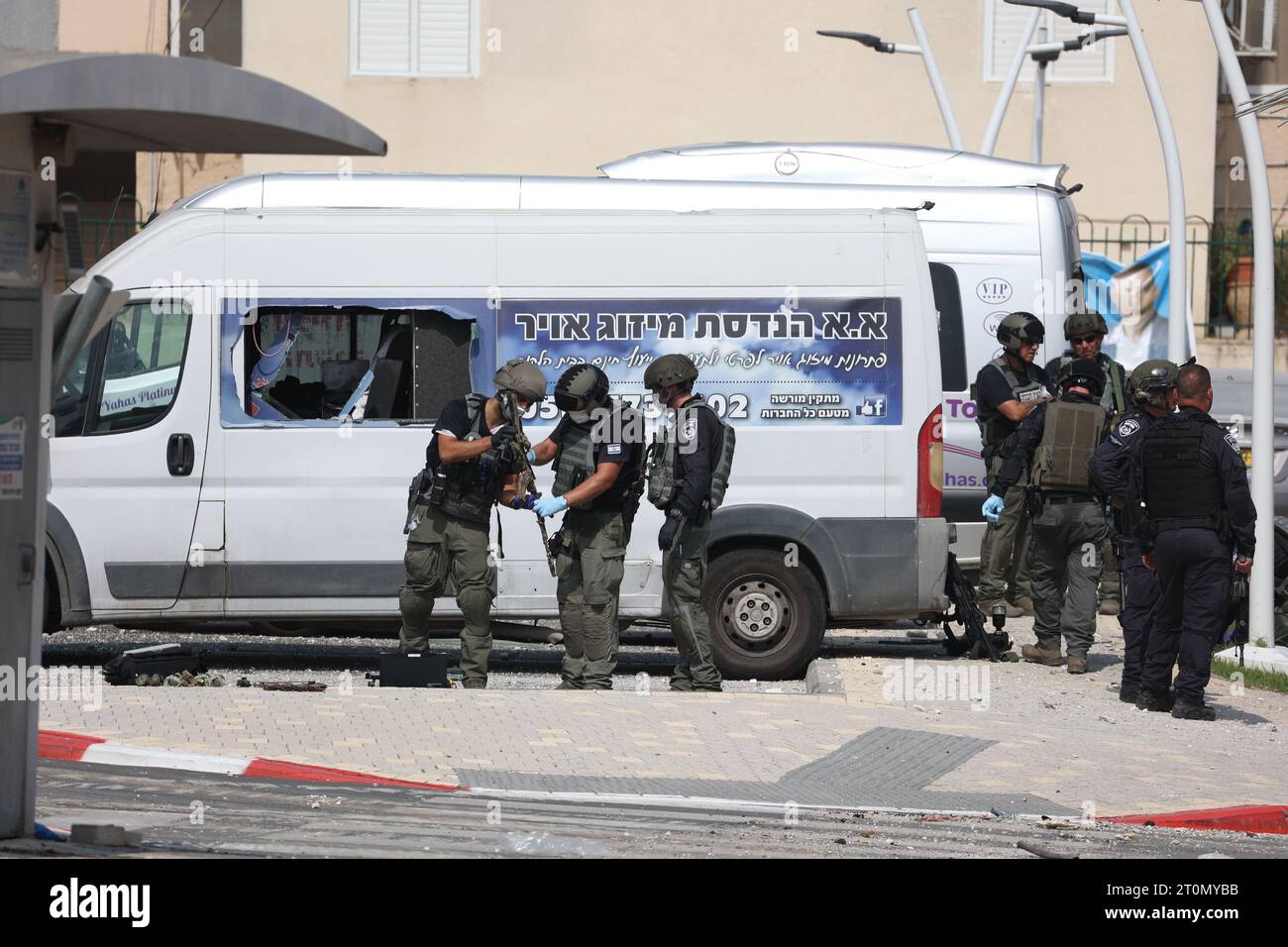 Sderot, Israel. 08th Oct, 2023. Security forces stand near the scene ...