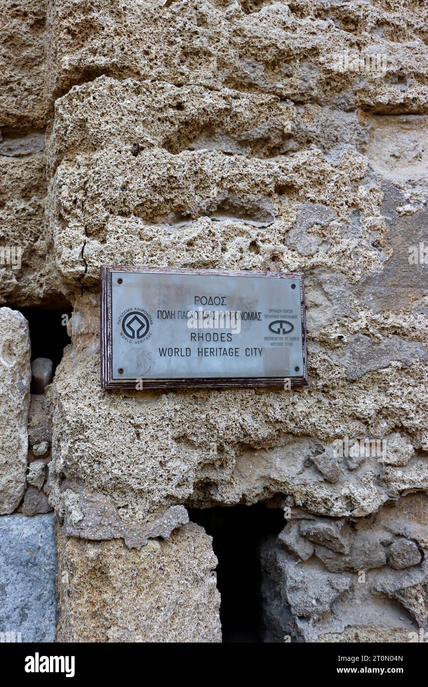 Rhodes World Heritage City sign hung at the Gate of Amboise entrance to ...