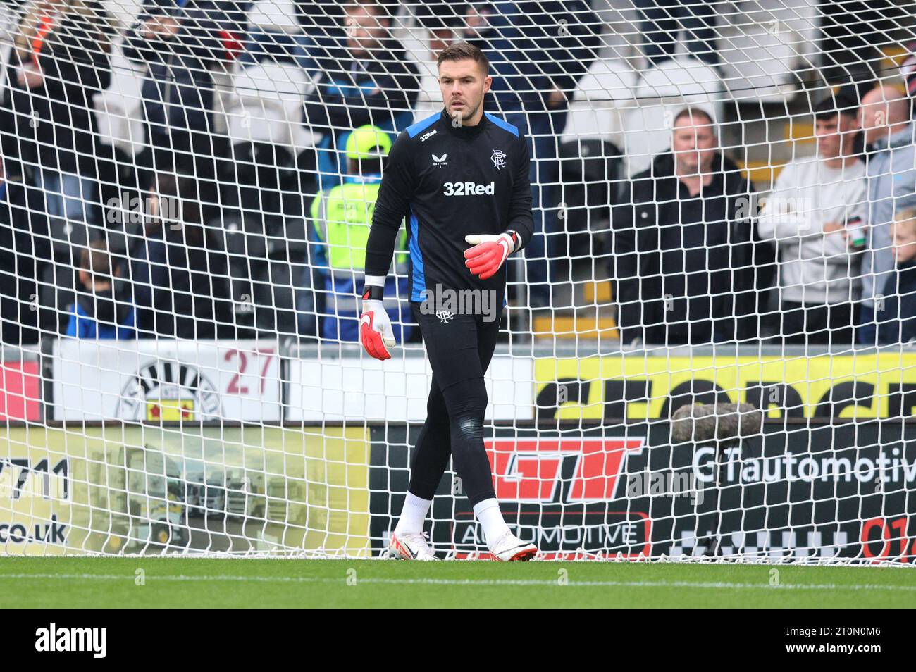 Rangers goalkeeper Jack Butland warming up prior to kick-off before the ...