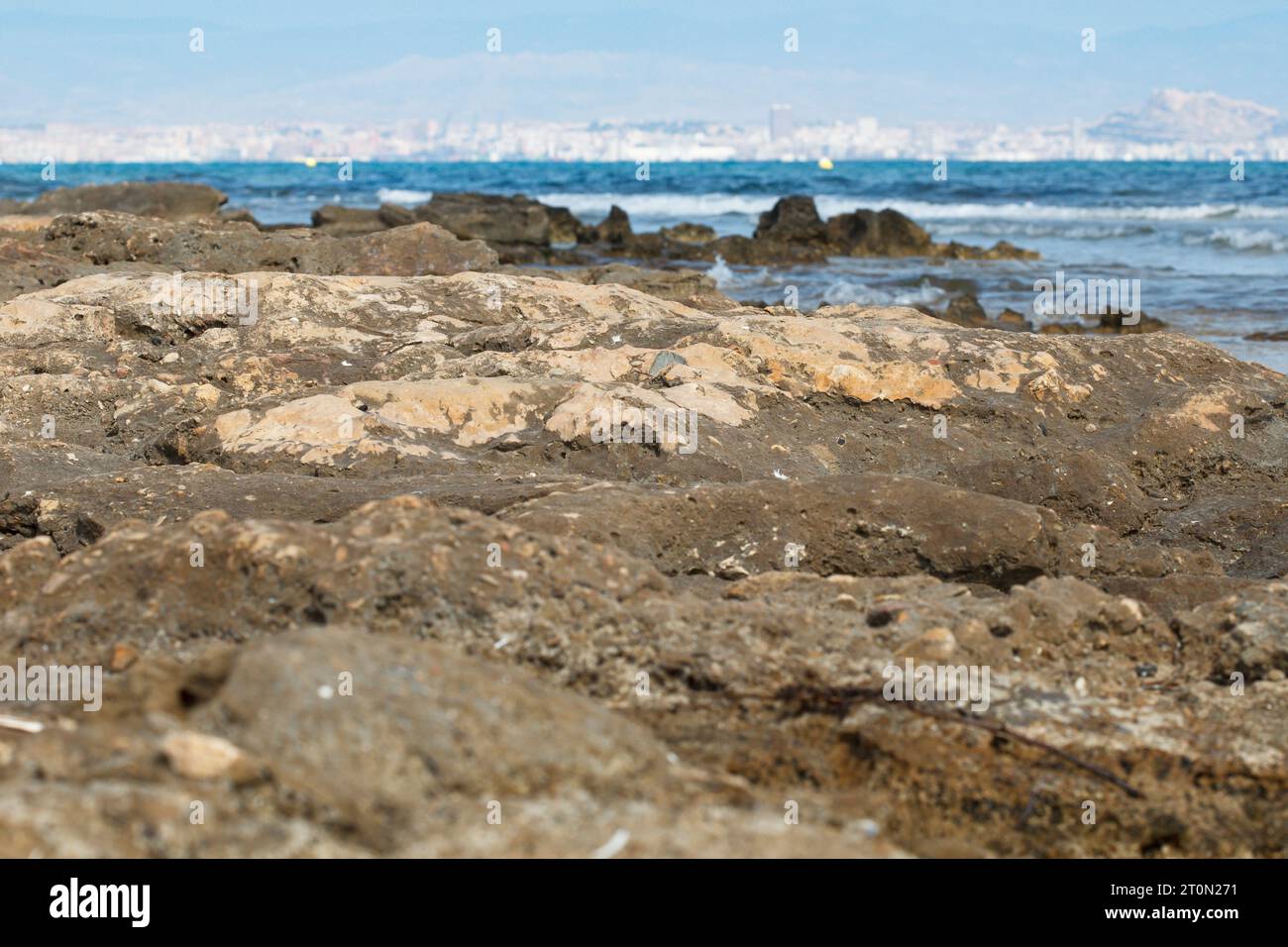 Stone beach in Arenales del Sol with blurred background of the ...