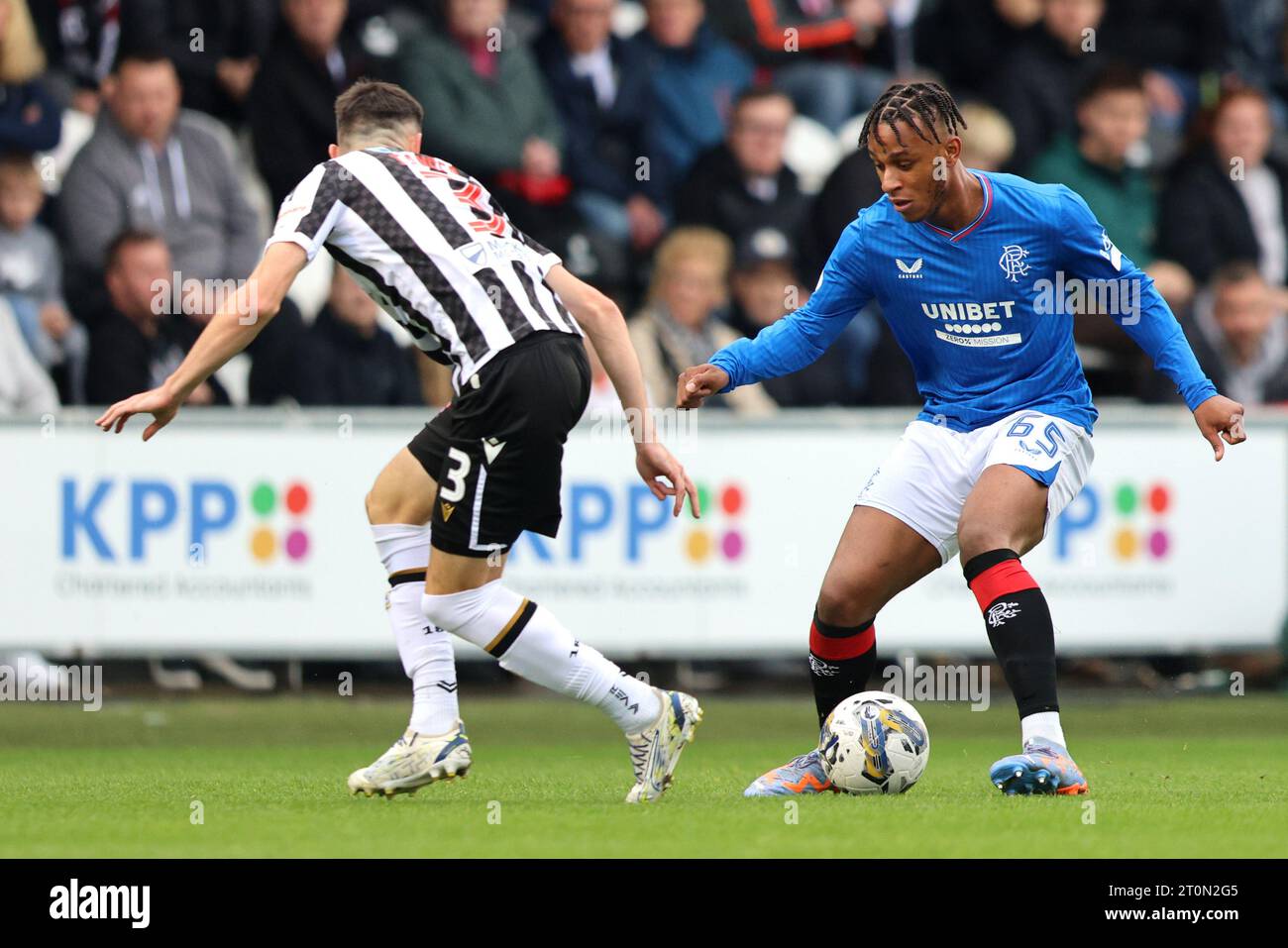 Rangers' Zak Lovelace (right) and St Mirren's Scott Tanser battle for ...