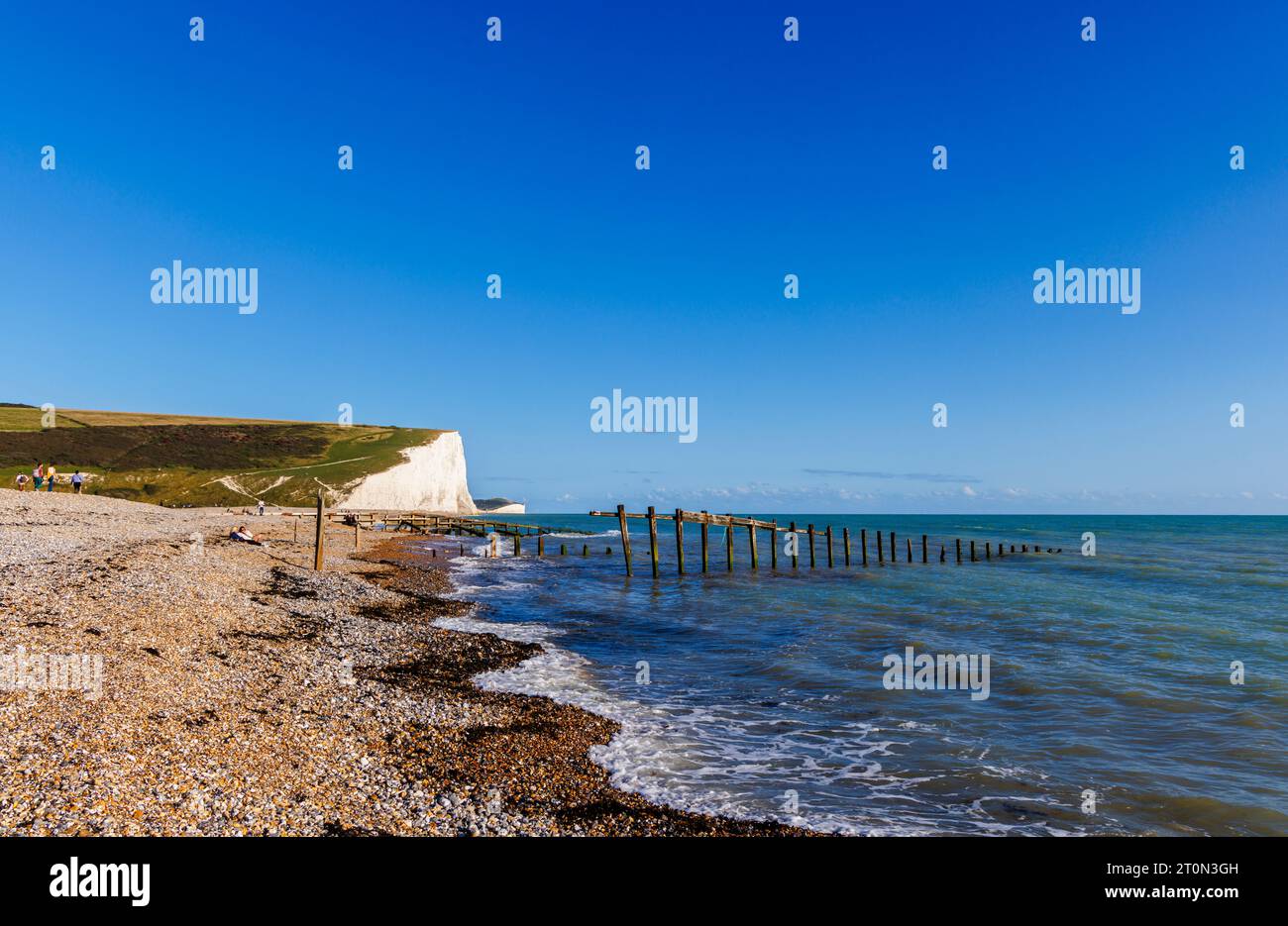 View of the Seven Sisters chalk cliffs from the beach at Cuckmere Haven ...