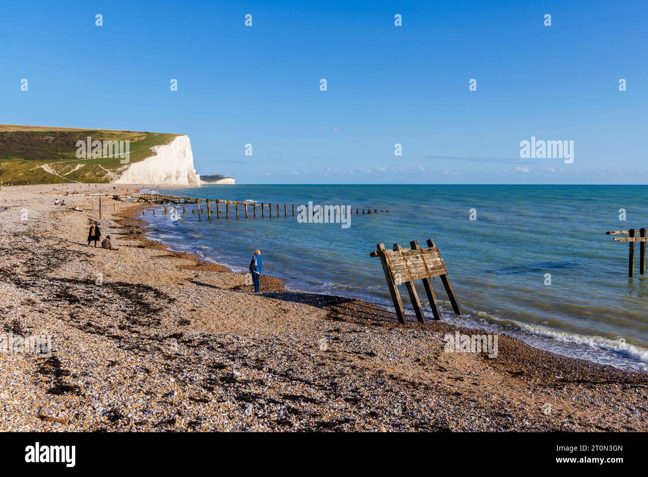View of the Seven Sisters chalk cliffs from the beach at Cuckmere Haven ...