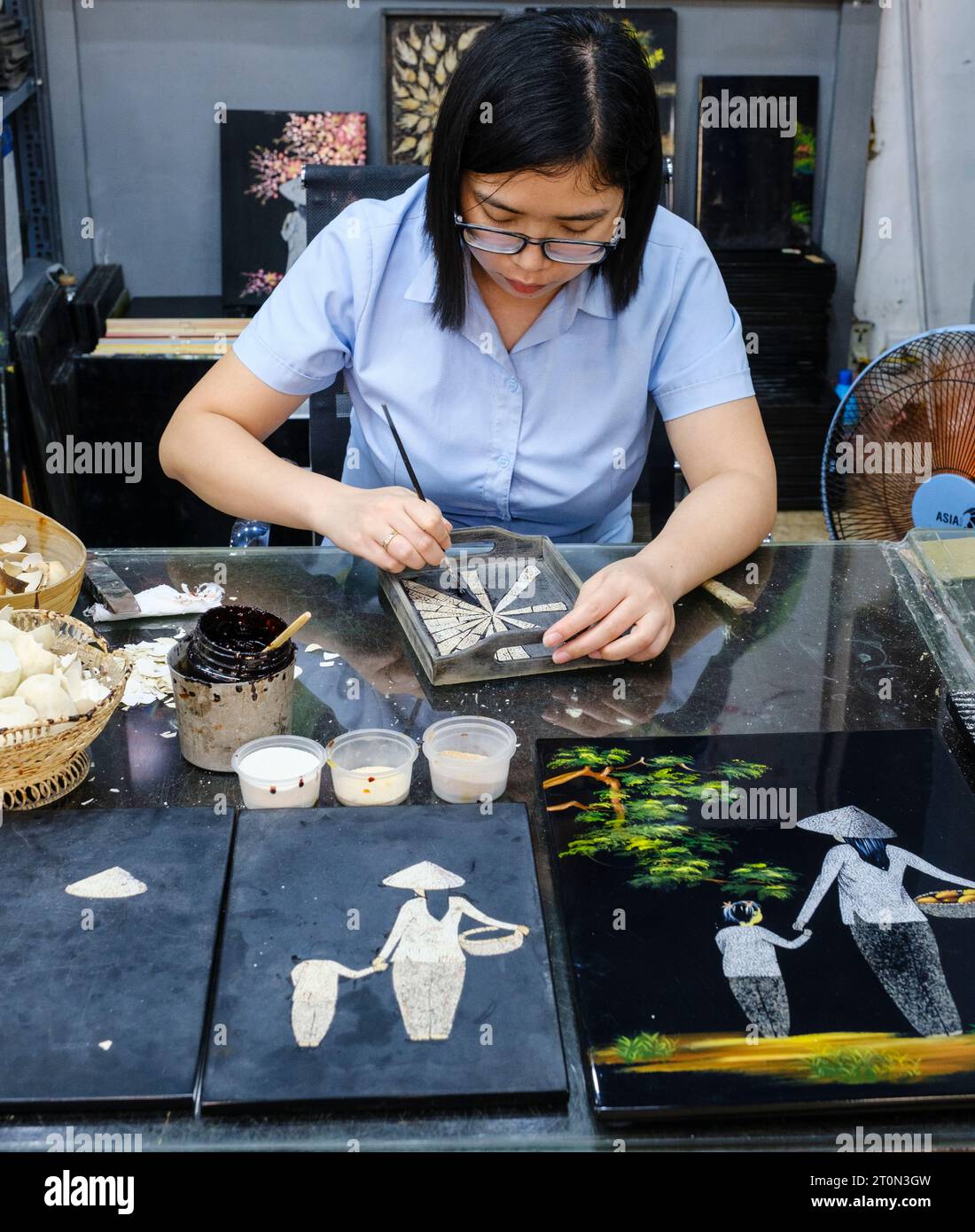 Hanoi, Vietnam. Artist at Work Cutting Seashell Fragments at Thu Huong ...