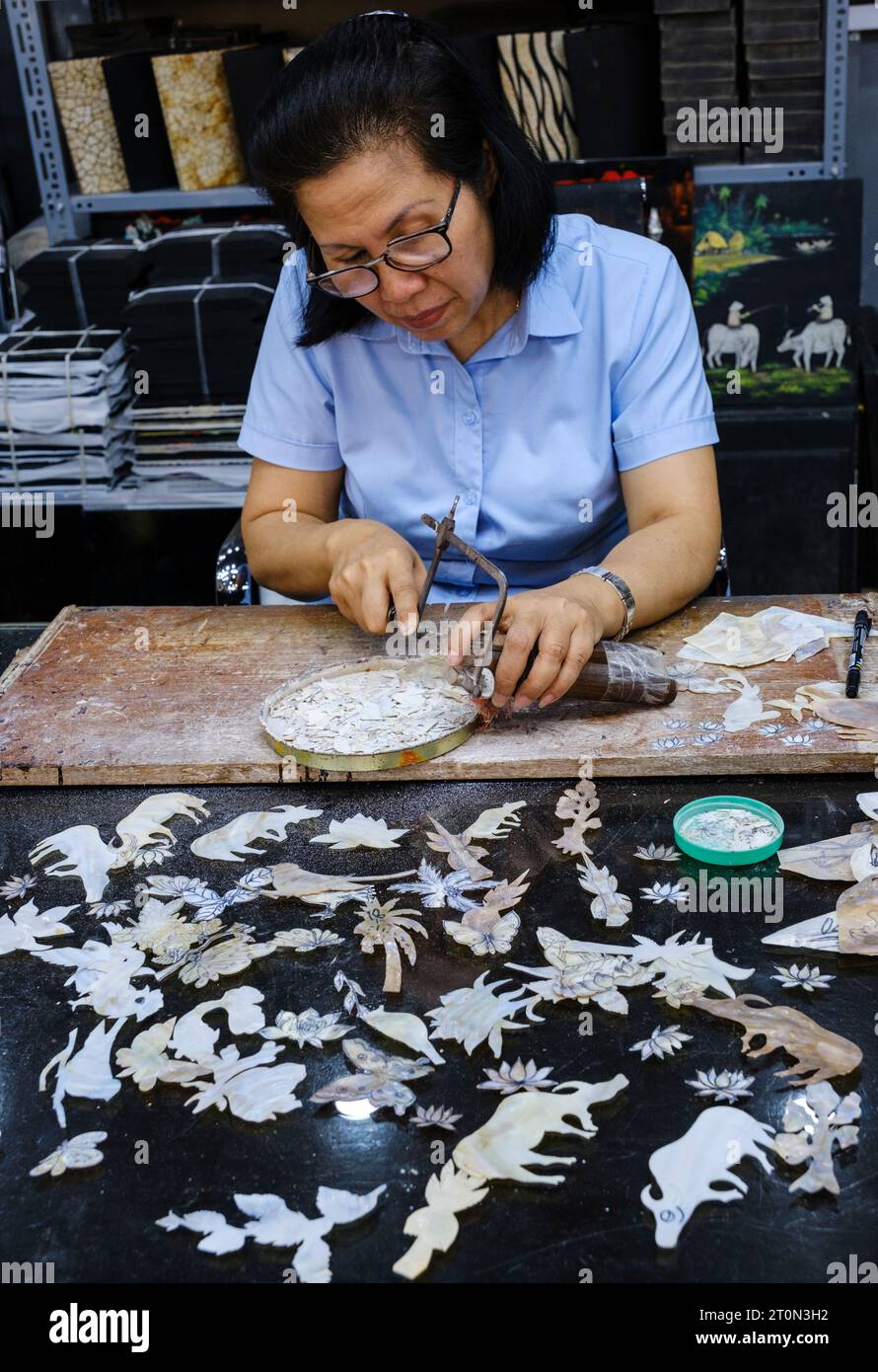 Hanoi, Vietnam. Artist at Work Cutting Seashell Fragments at Thu Huong ...