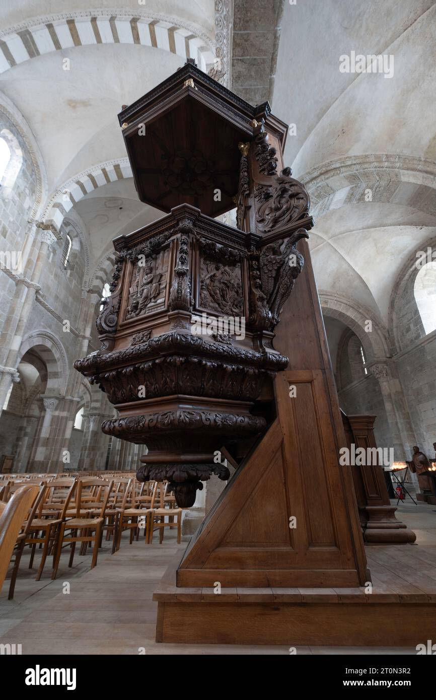 Interior with richly carved wooden pulpit of the Benedictine and ...
