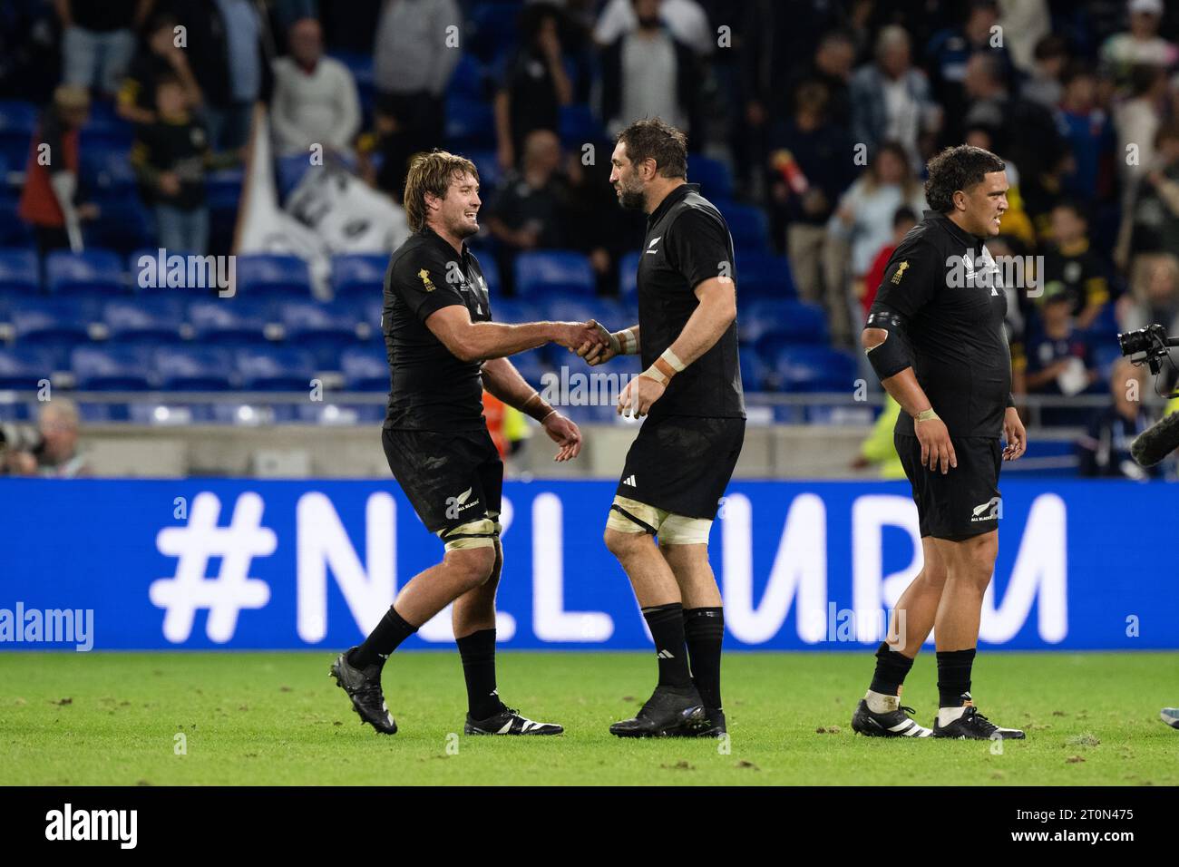 (L-R) Ethan Blackadder (NZL), Samuel Whitelock (NZL) celebrate at the ...