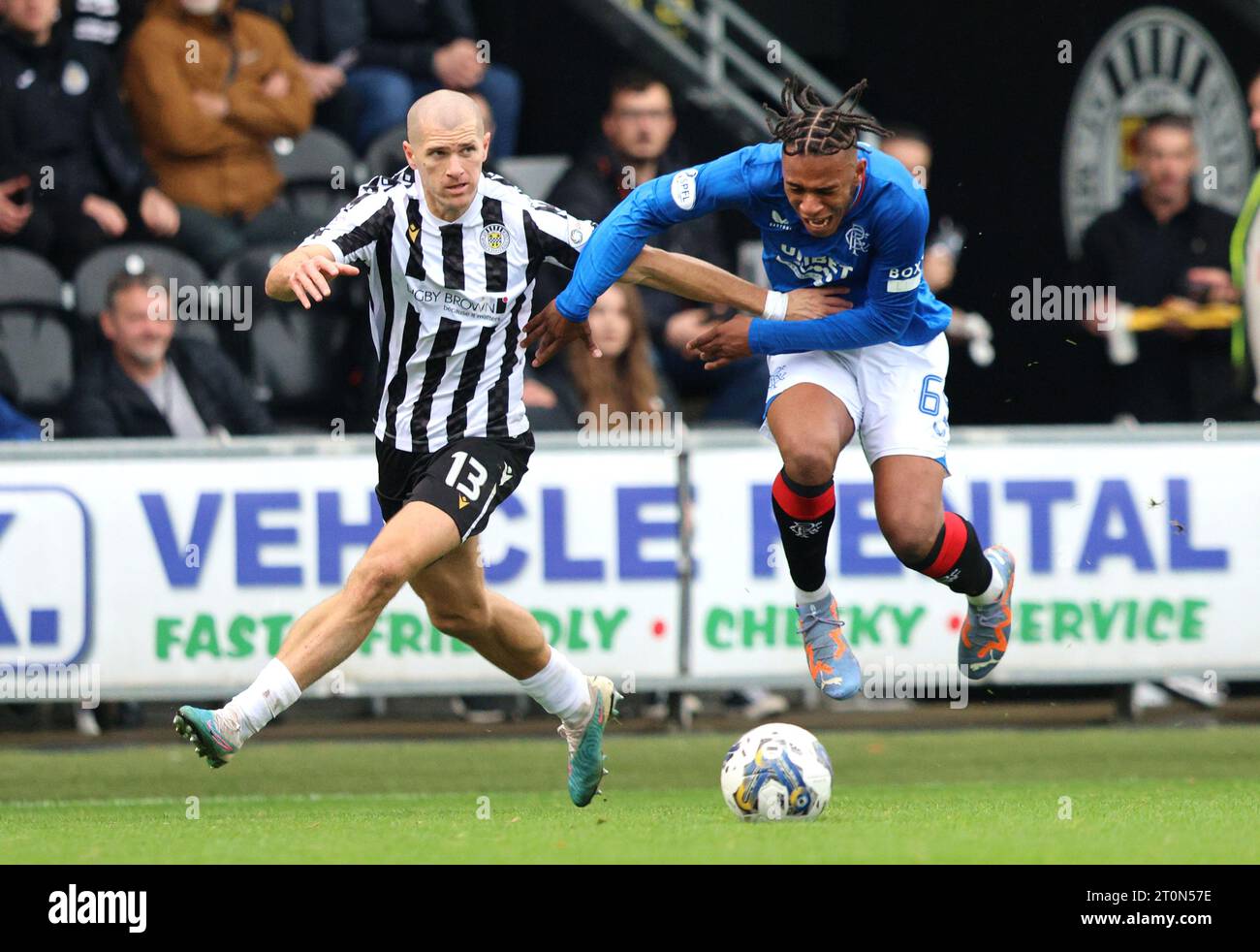 St Mirren's Alex Gogic (left) and Rangers' Zak Lovelace battle for the ...